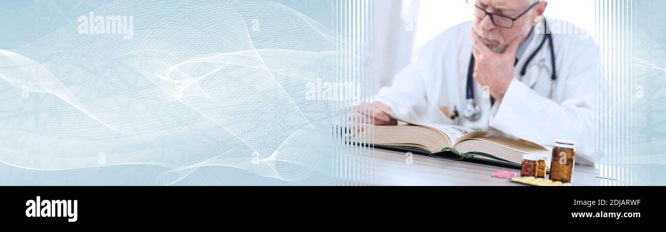 Senior doctor reading a textbook in medical office; panoramic banner ...