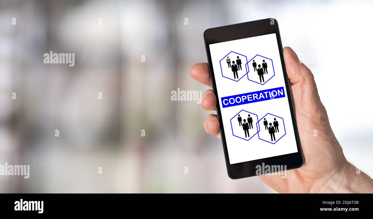Smartphone screen displaying a cooperation concept Stock Photo - Alamy