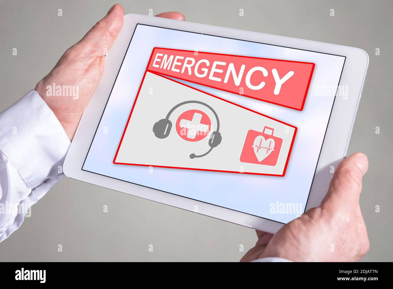 Tablet screen displaying an emergency concept Stock Photo - Alamy
