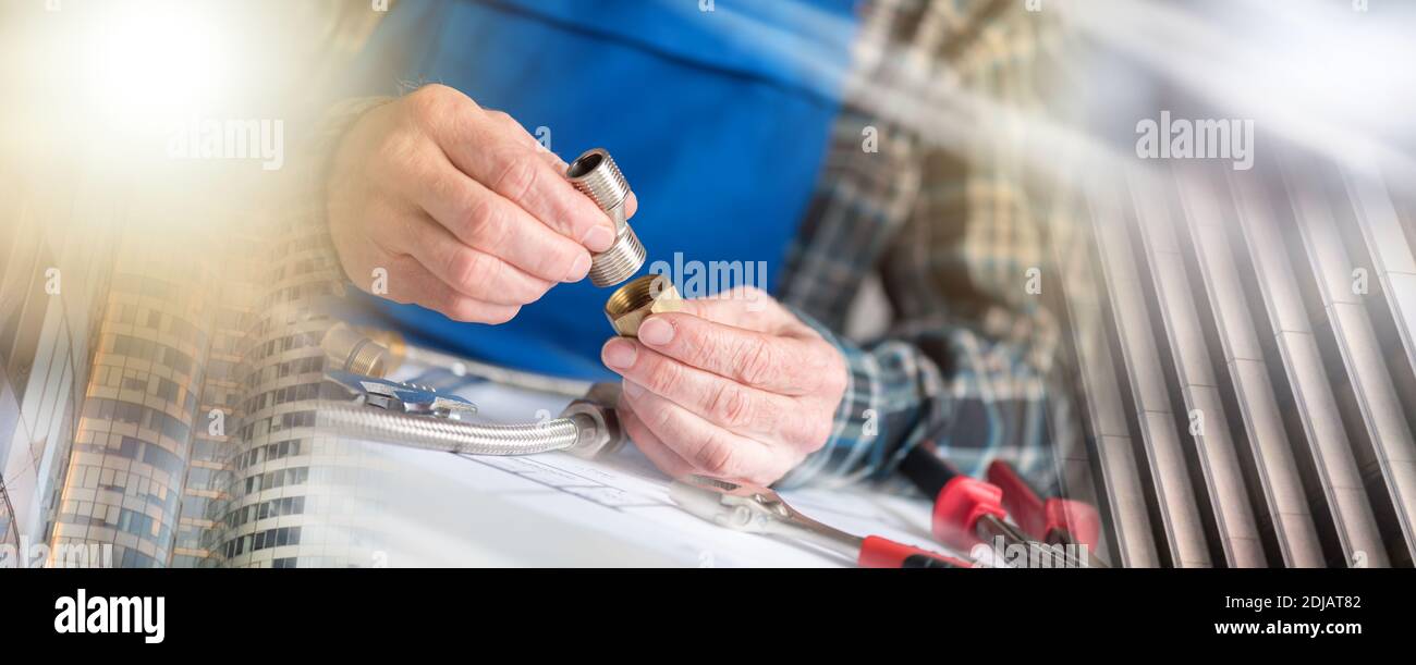 Plumber hands using plumbing fittings, light effect; multiple exposure ...