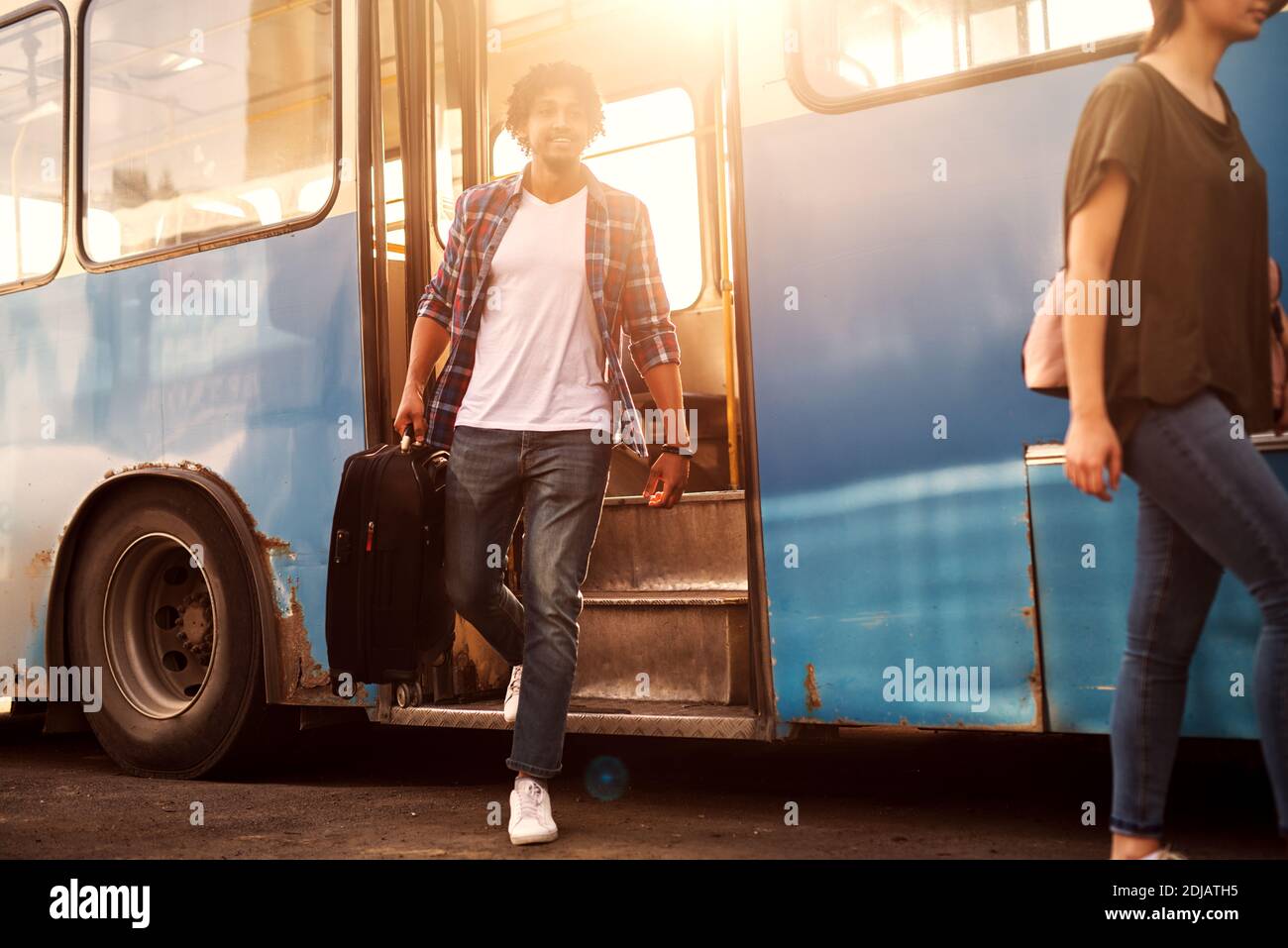Black african woman waiting bus hi-res stock photography and images - Alamy