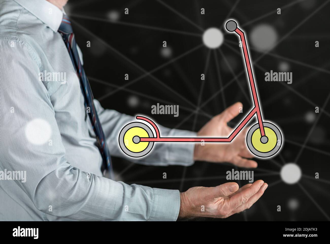 Scooter concept above the hands of a man Stock Photo - Alamy