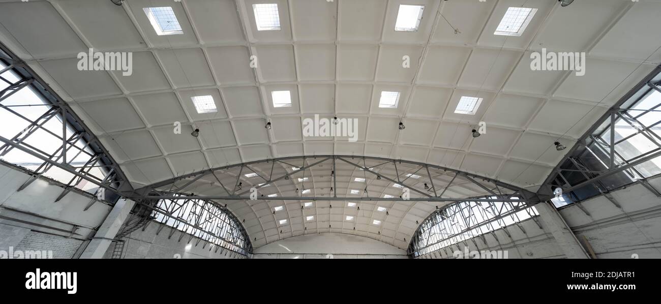 Hemispherical reinforced concrete load bearing roof with windows in ...