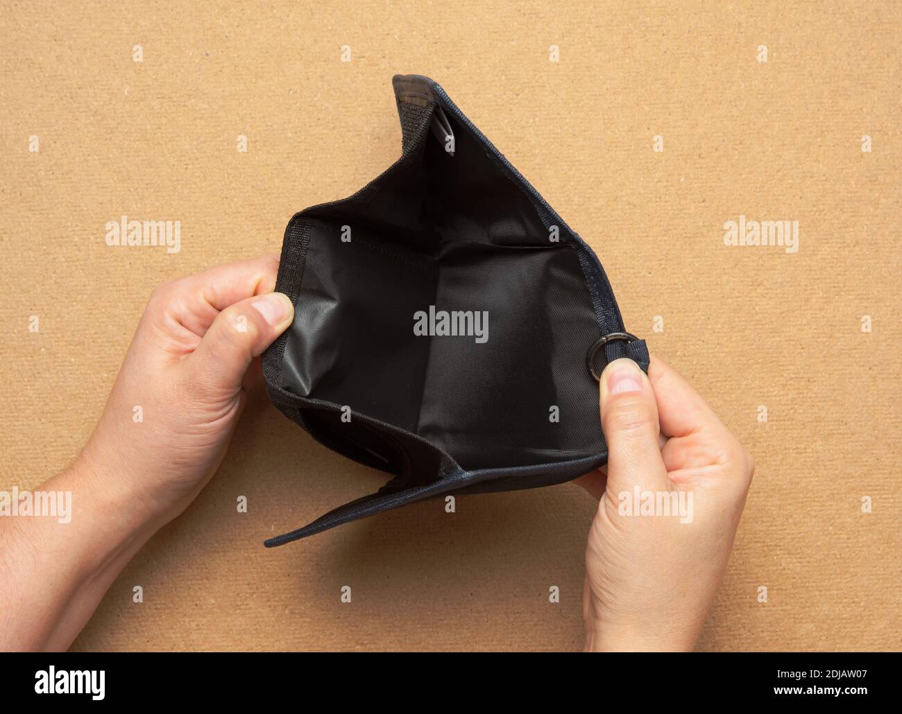 female hands hold blue open empty wallet for cash, top view Stock Photo ...