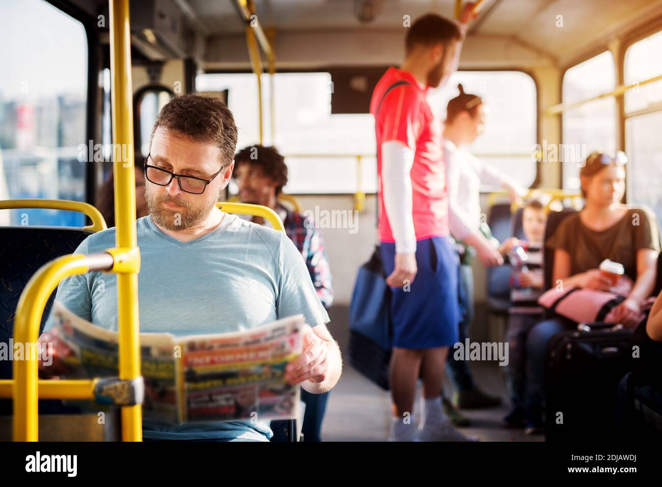 People Reading Newspaper On Bus Bus Driver Reading Newspaper Before