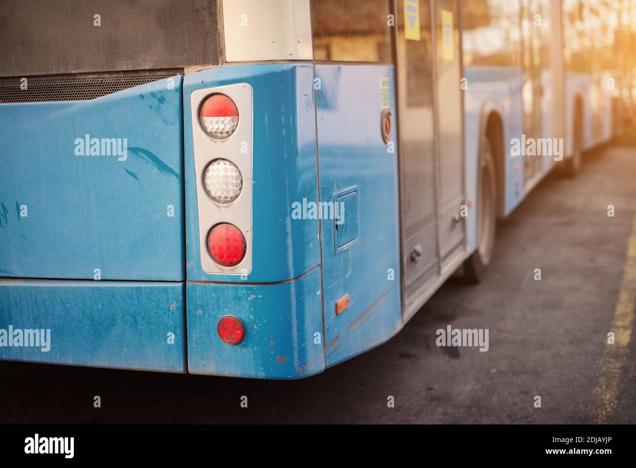 Rear end of the blue bus Stock Photo - Alamy