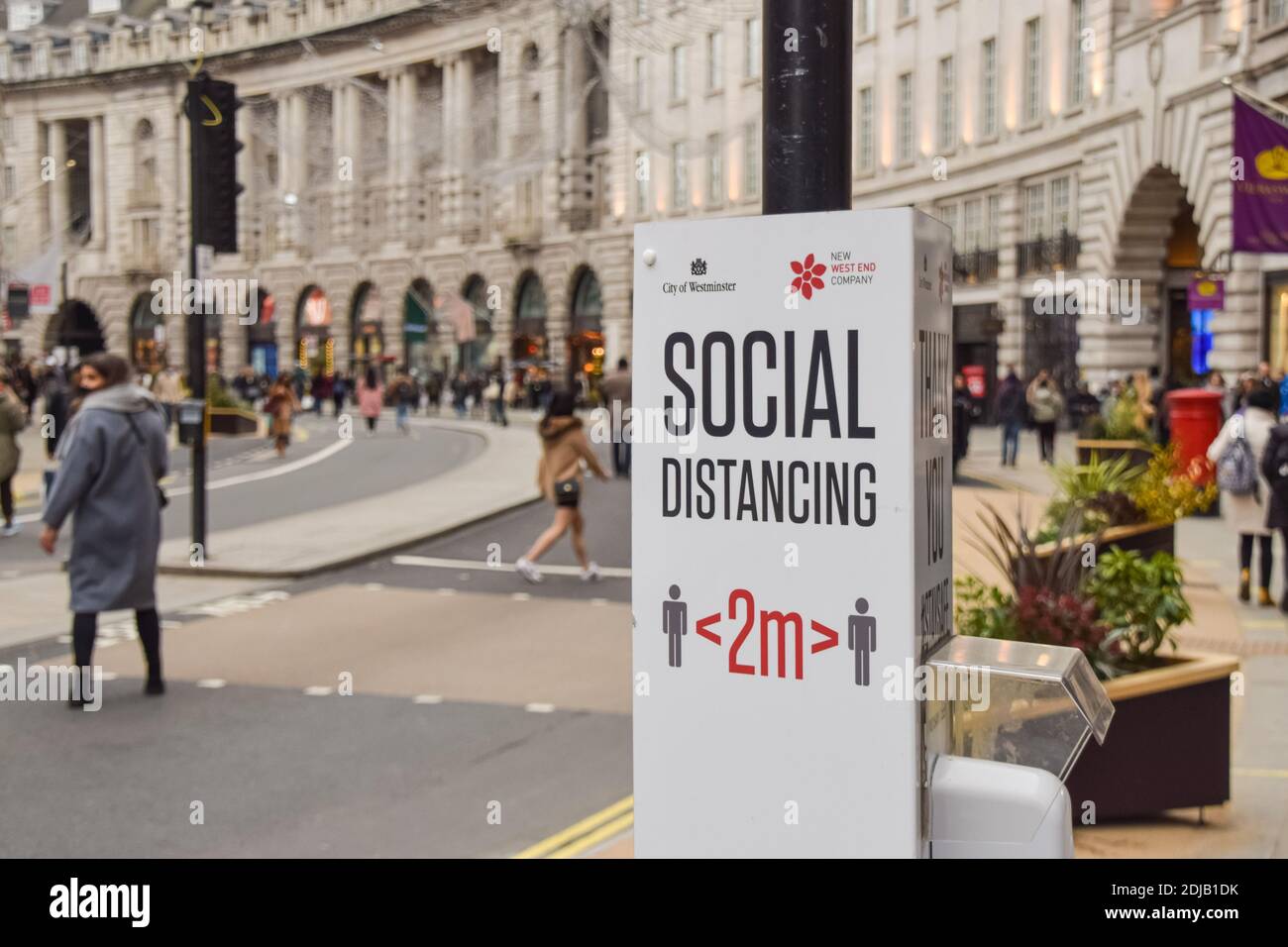 Social Distancing sign on Regent Street, London Stock Photo - Alamy