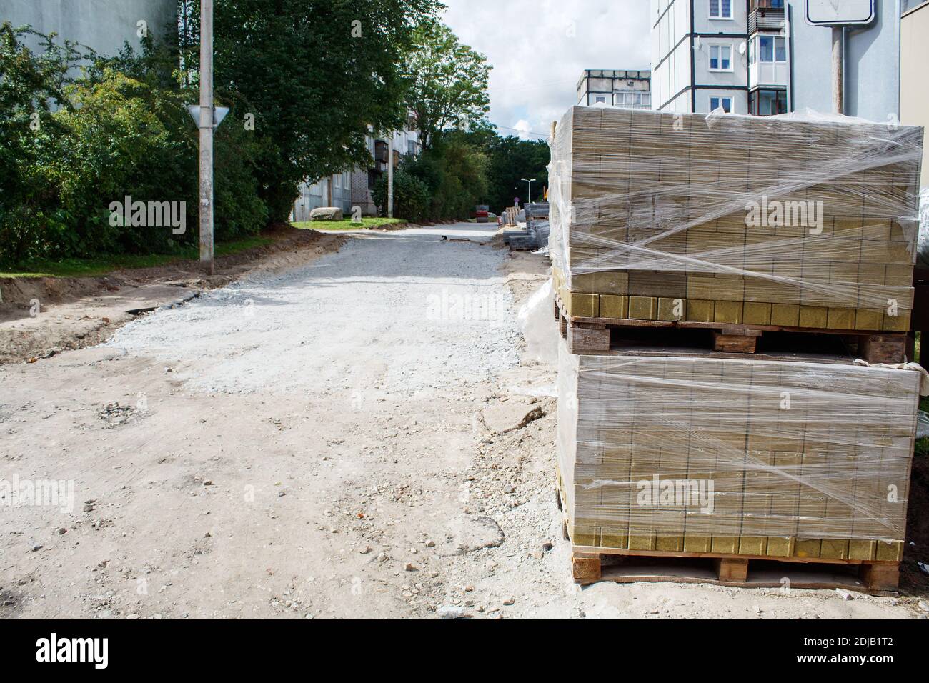stacks of paving slabs prepared for laying outdoor on sunny summer day ...