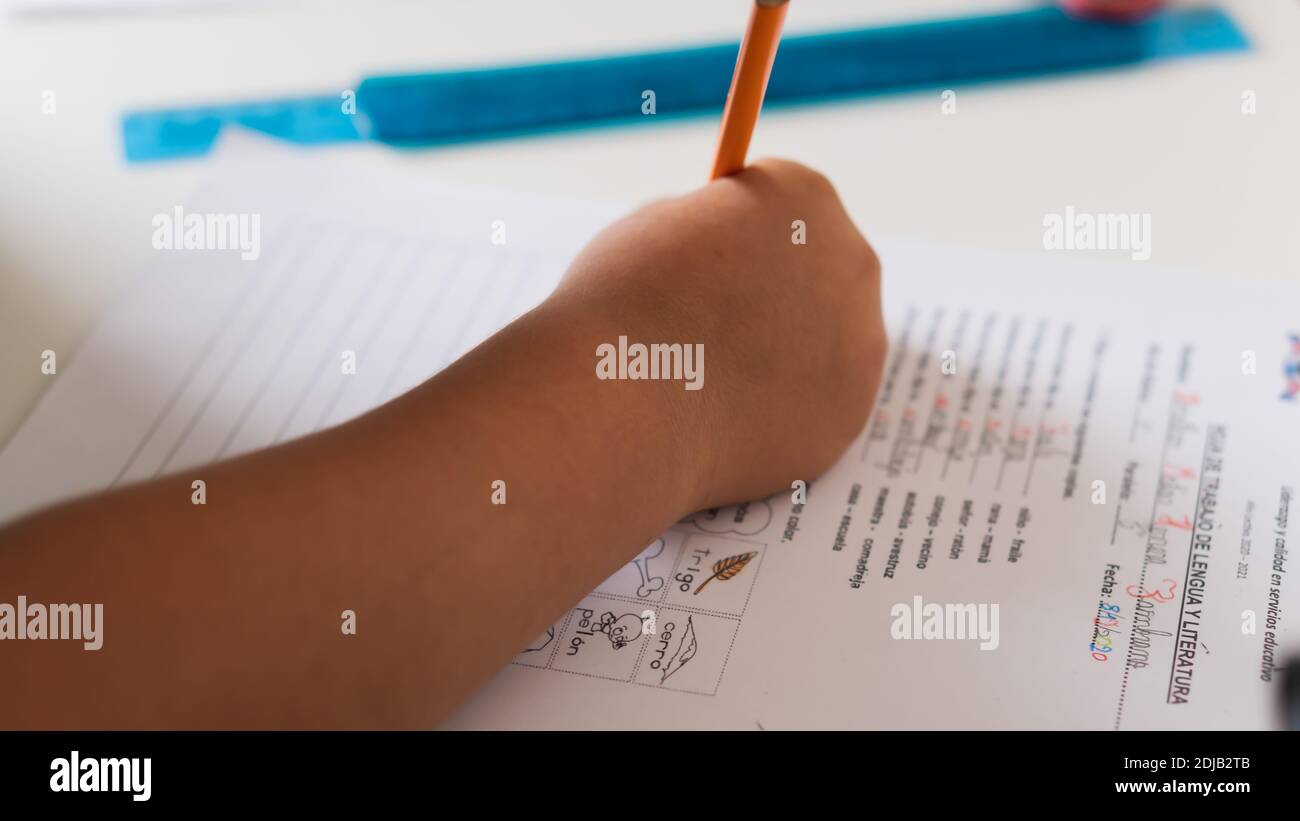 A of a child studying at home Stock Photo - Alamy