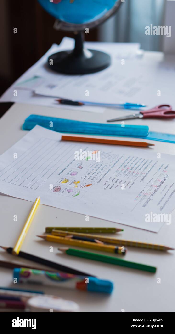 A vertical shot of educational supplements for a child's education ...