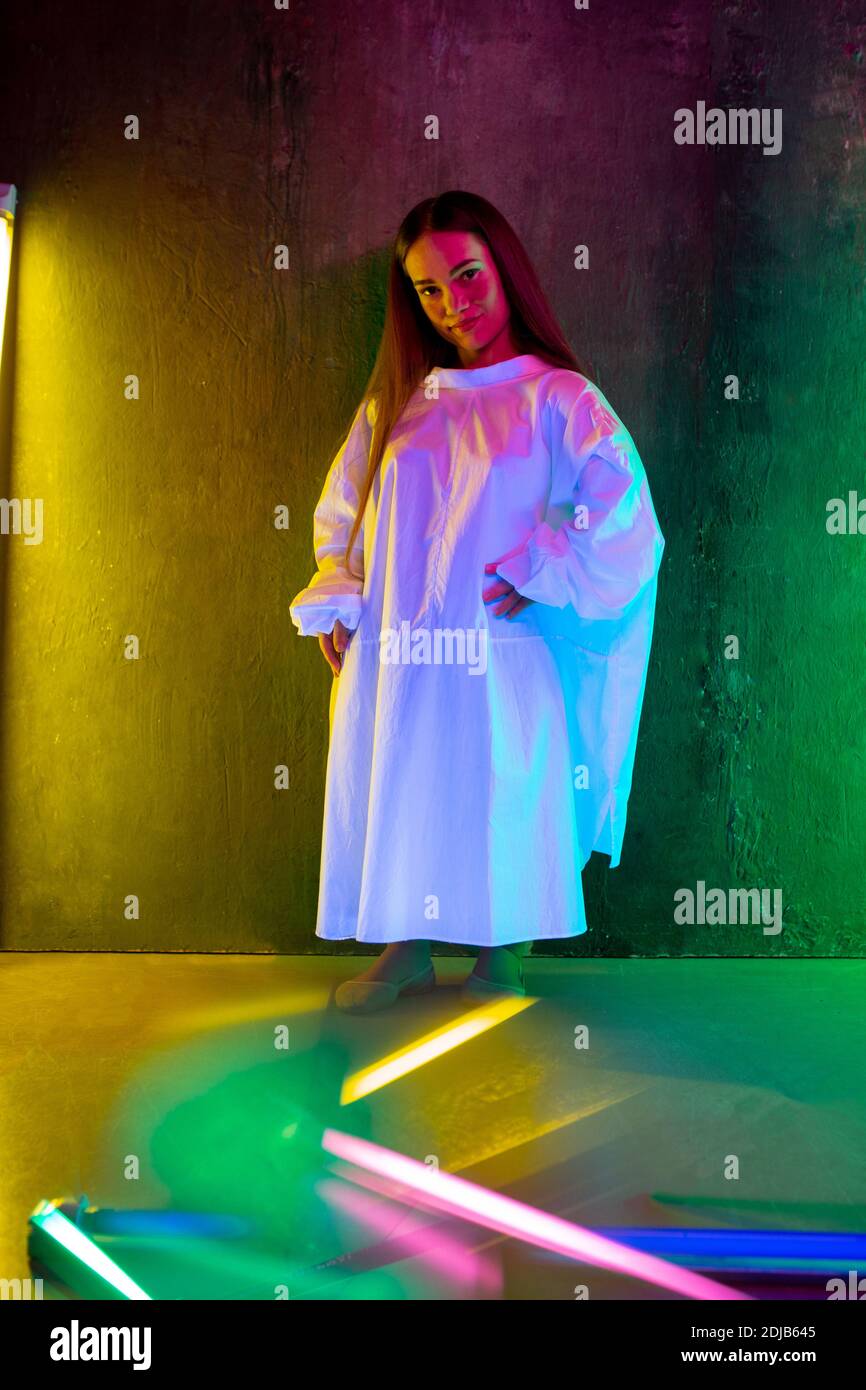 Style. Caucasian female inclusive model posing on studio background in ...