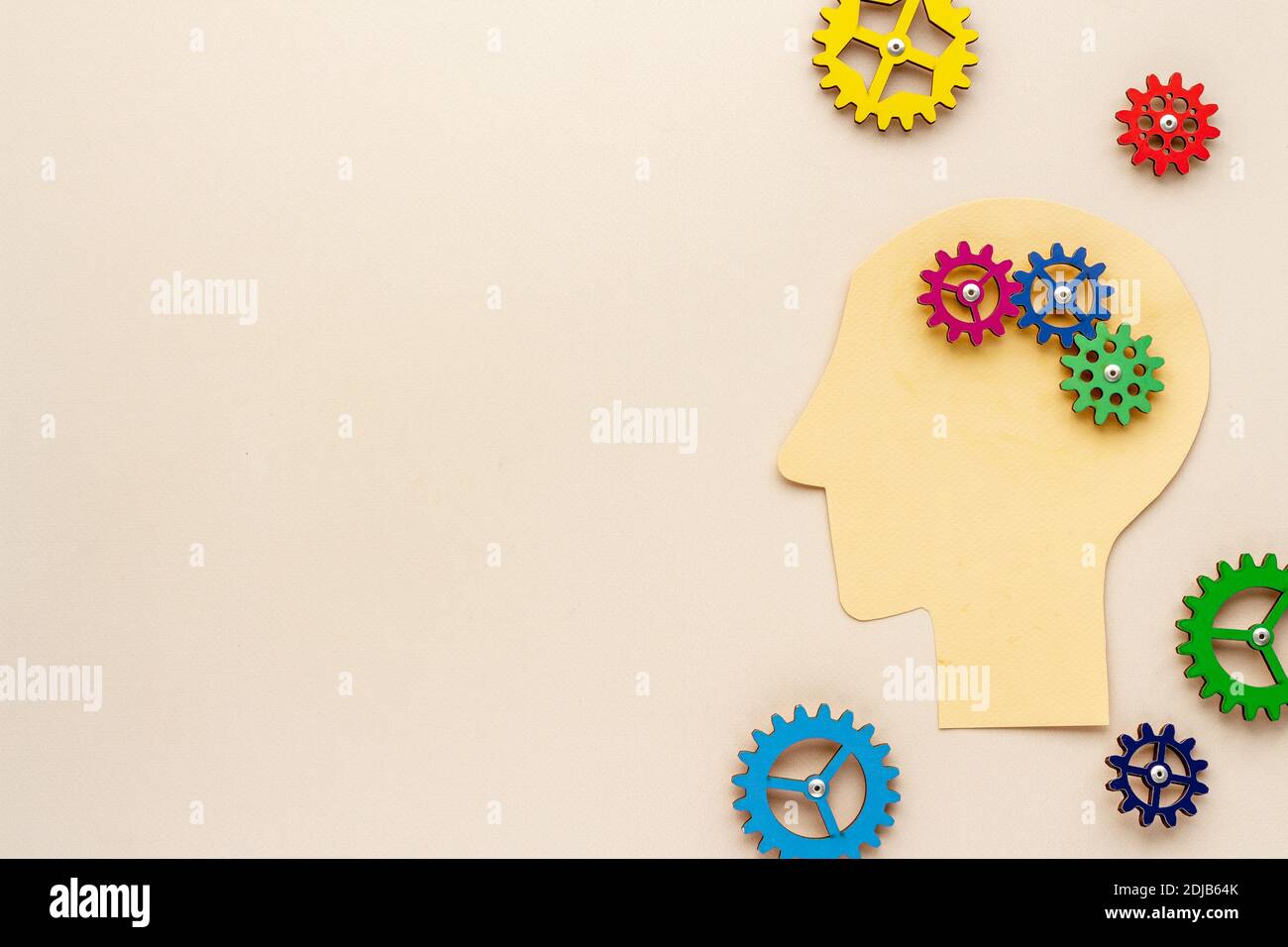 Idea concept. Human brain of gears on the paper head, top view Stock ...