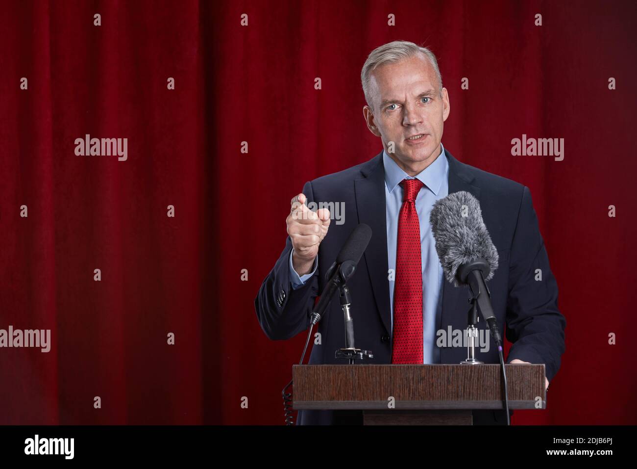 Man Speaking At Meeting