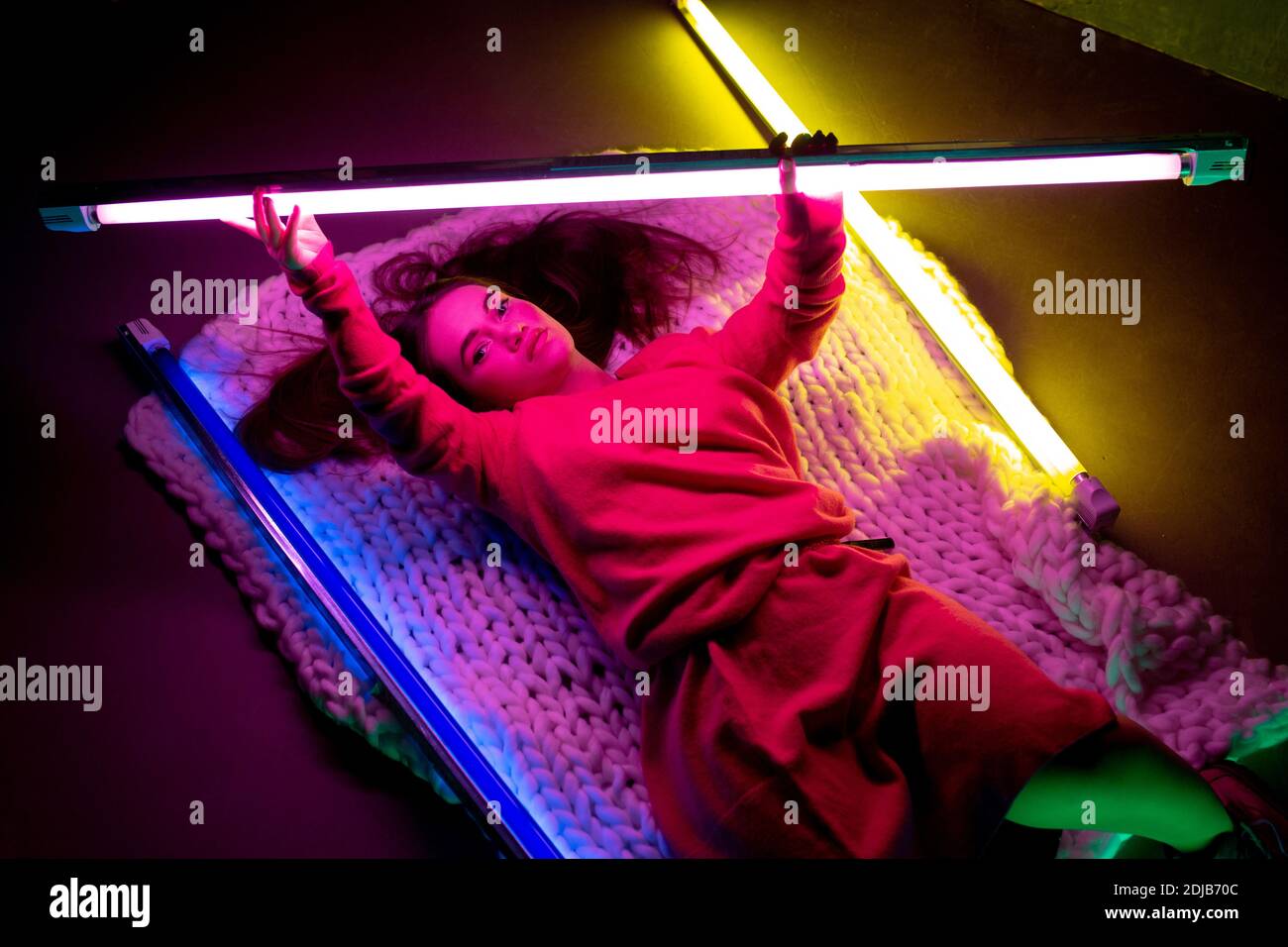 Stunning. Caucasian female inclusive model posing on studio background ...