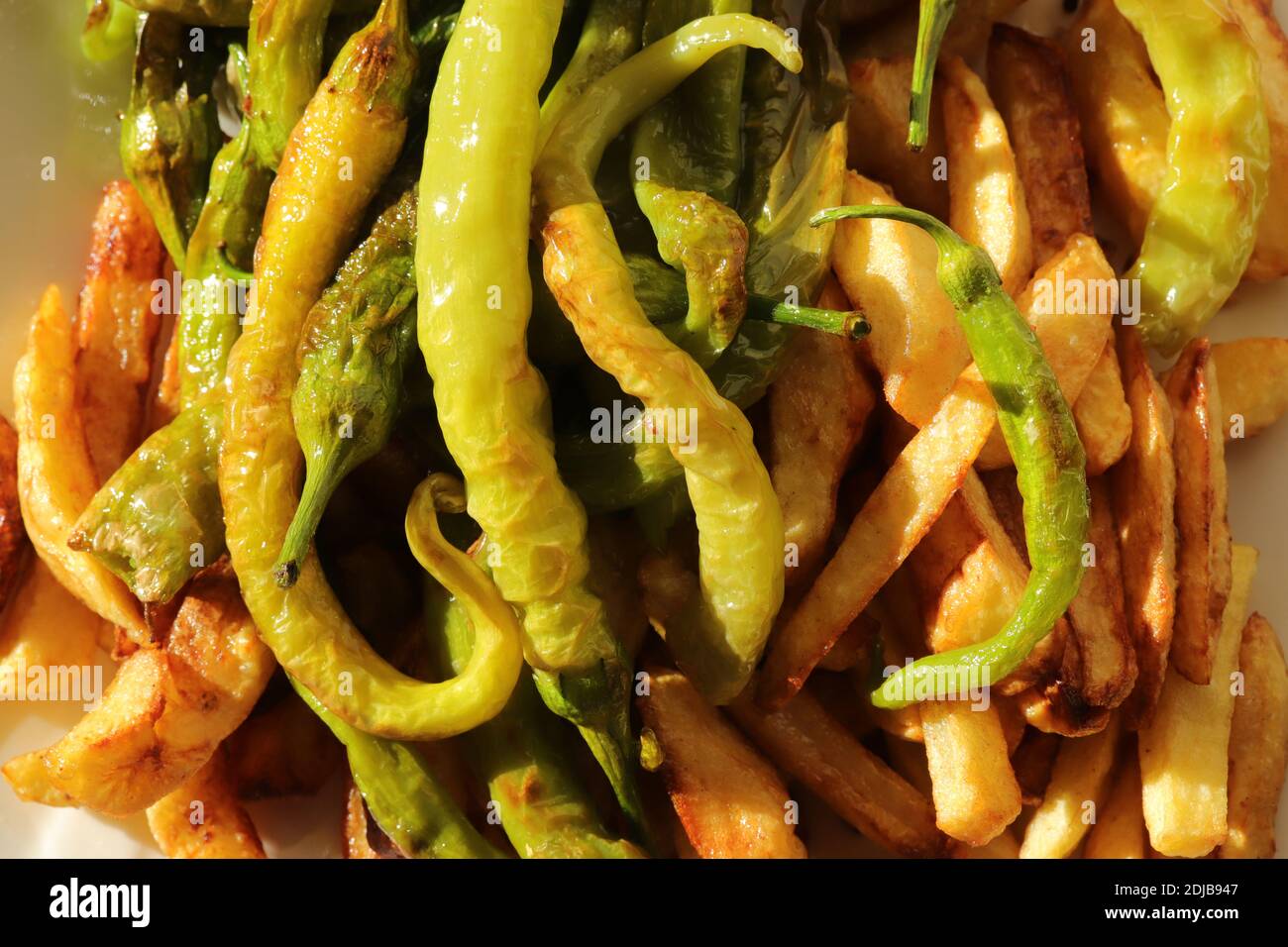 French fries and peppers. Food background Stock Photo - Alamy