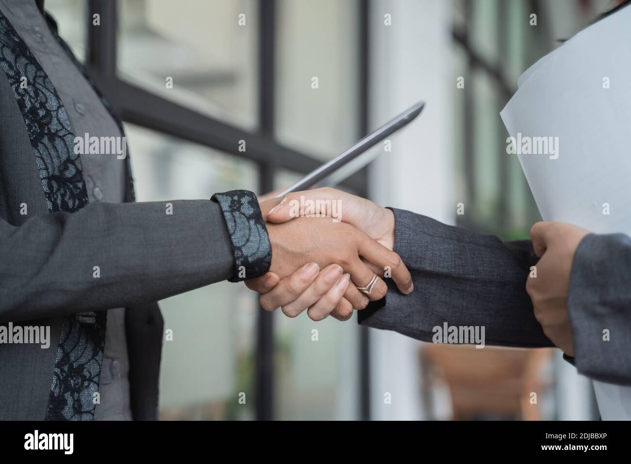 Close up portrait of both hands in a cafe agreed mutual agreement Stock ...