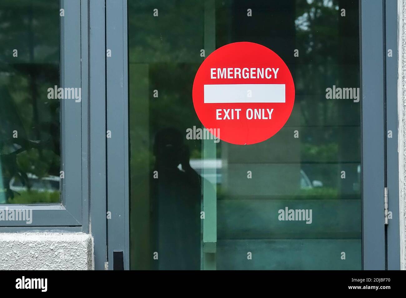 Emergency exit sign on glass hi-res stock photography and images - Alamy