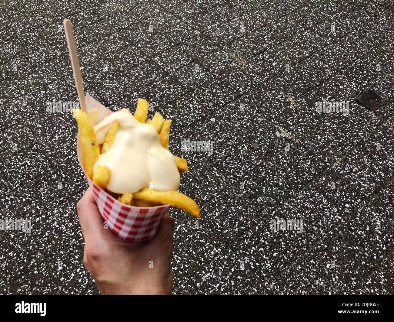 Hand holding french fries mayonnaise hi-res stock photography and ...
