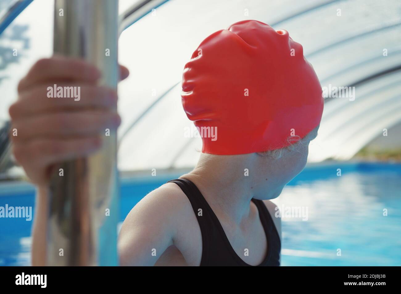 Red swimming cap hi-res stock photography and images - Alamy
