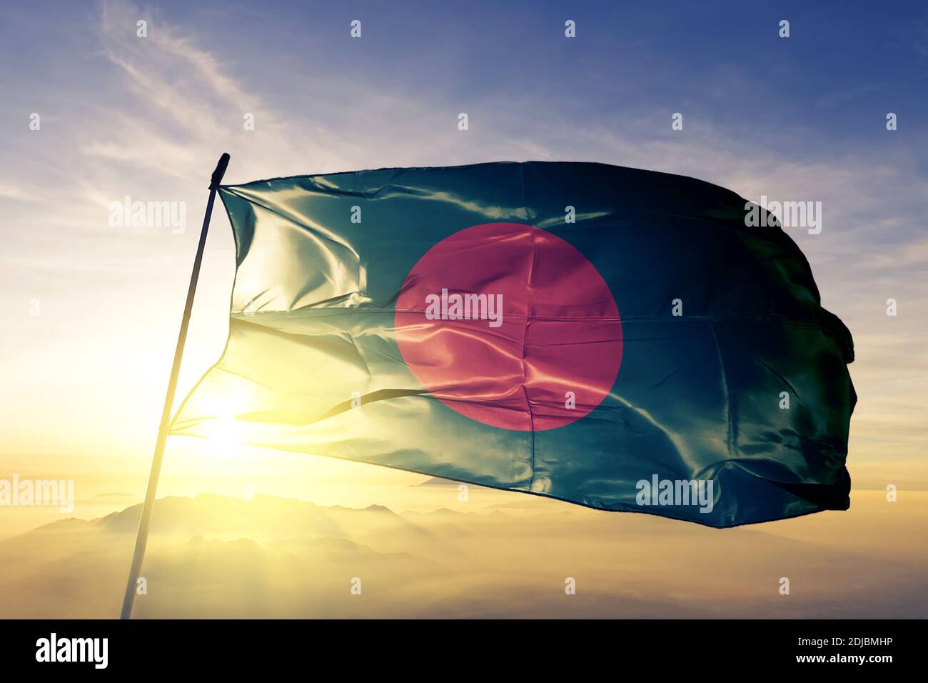 Bangladesh flag waving on the top sunrise mist fog Stock Photo - Alamy