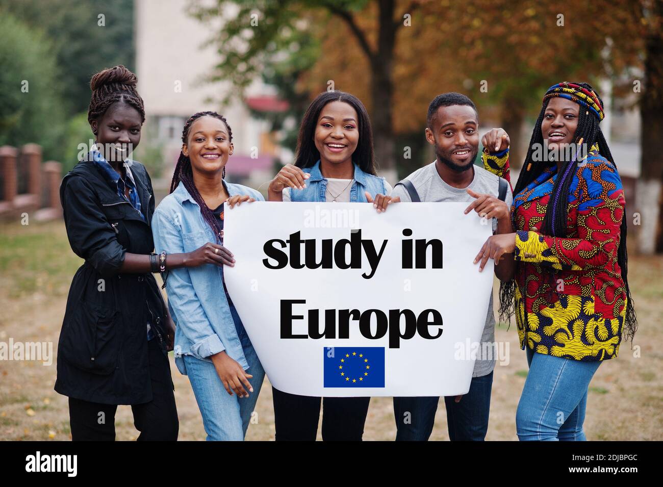 Study in Europe. Group of five african college students on campus at ...