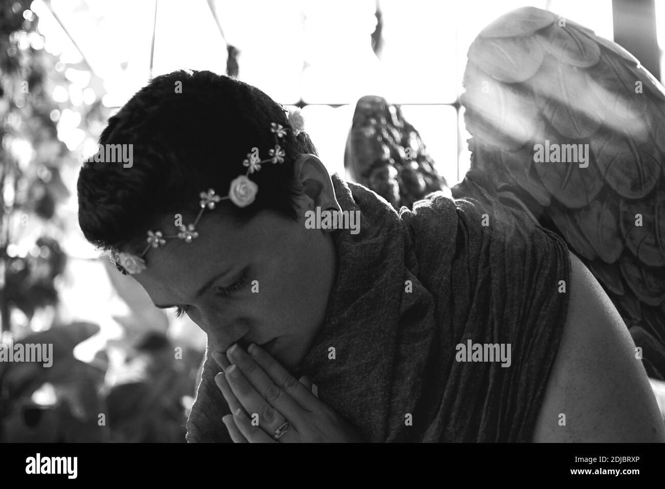 Adult angel bending bending hi-res stock photography and images - Alamy