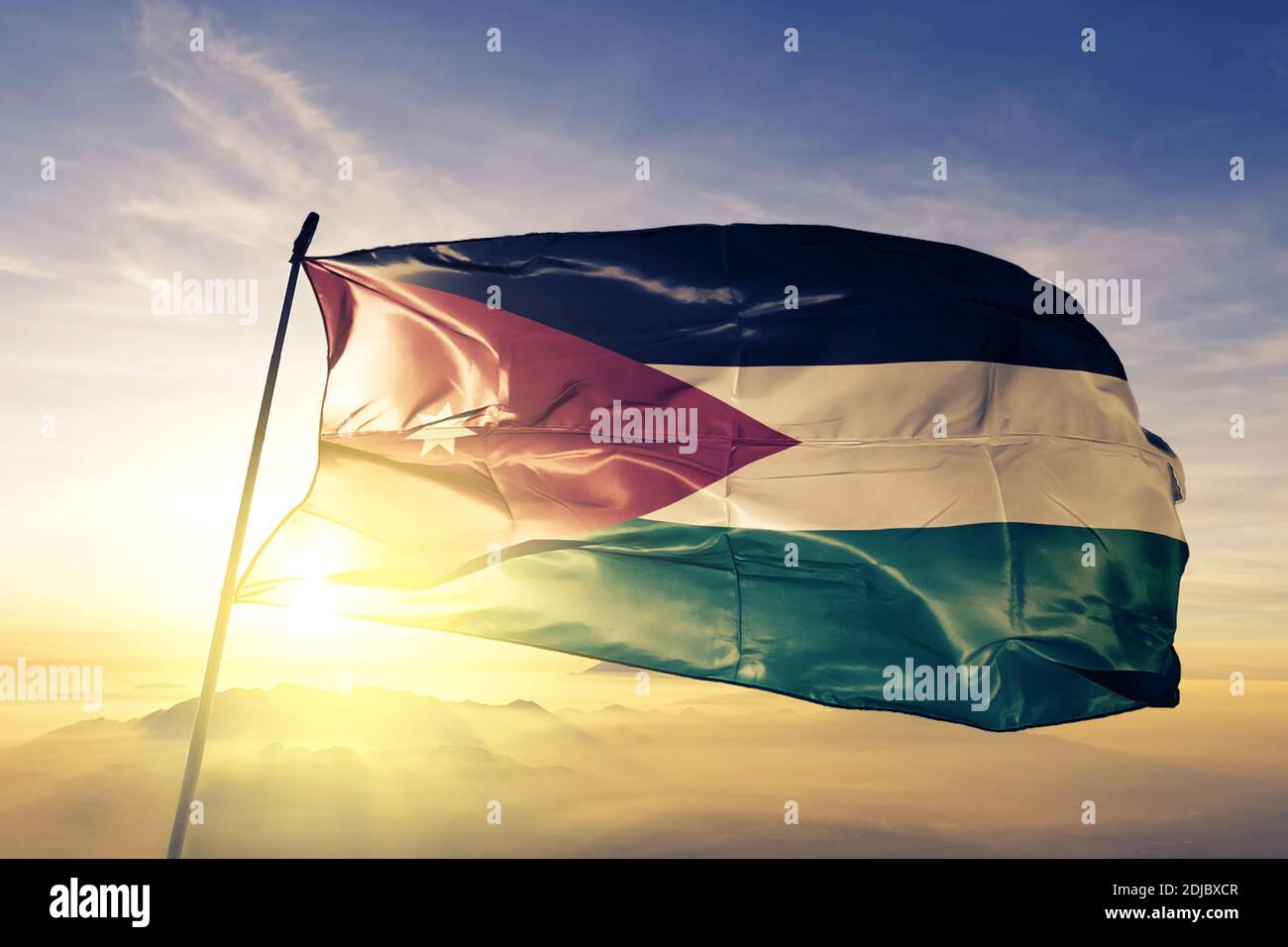 Jordan flag waving on the top sunrise mist fog Stock Photo - Alamy
