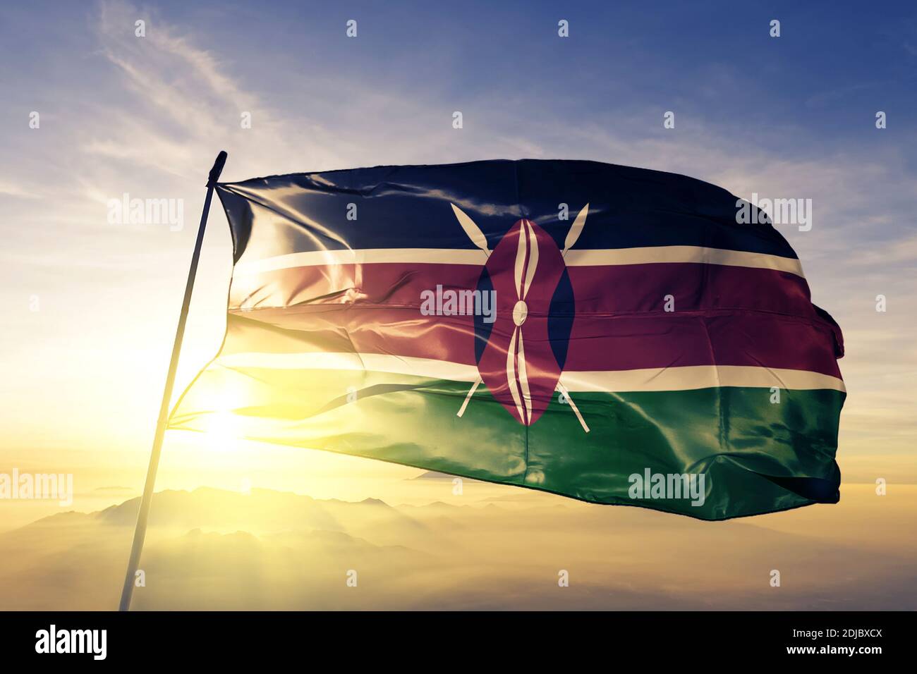 Kenya flag waving on the top sunrise mist fog Stock Photo - Alamy