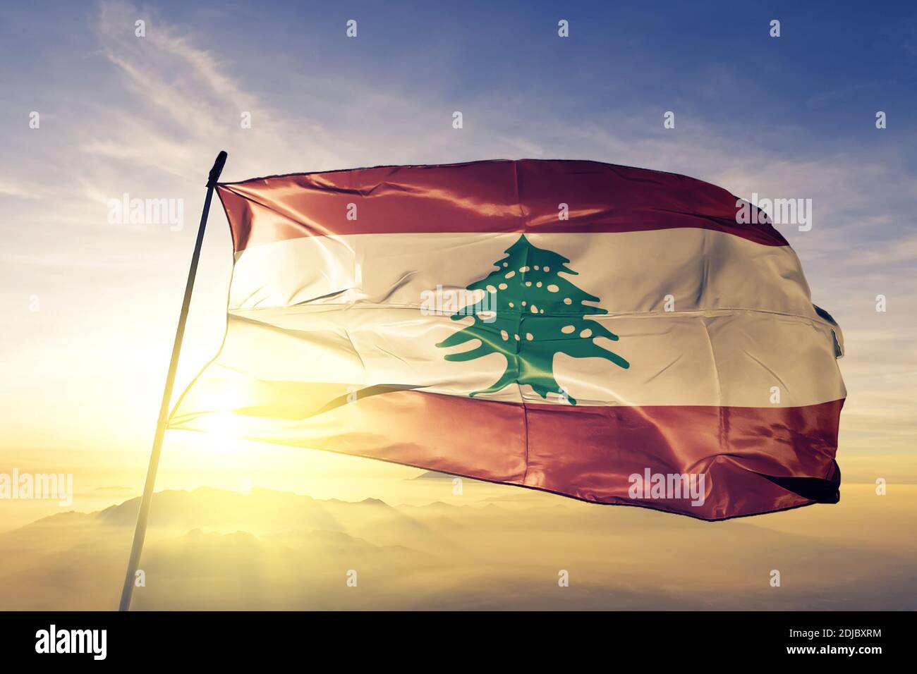 Lebanon flag waving on the top sunrise mist fog Stock Photo - Alamy