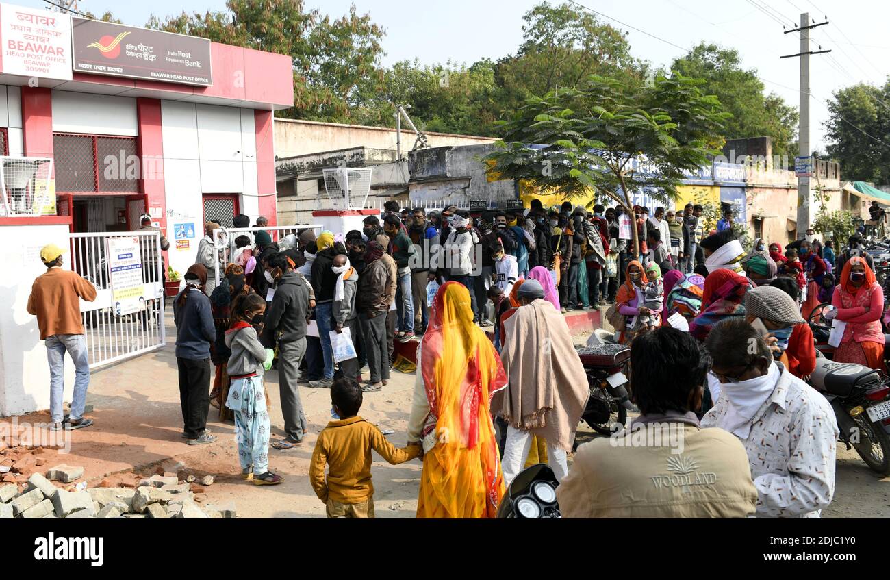Beawar, Rajasthan, India, Dec. 14, 2020: Indian people stand in long ...