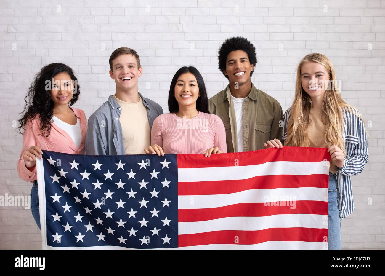 Immigration, relocation and study abroad. Cheerful young international ...