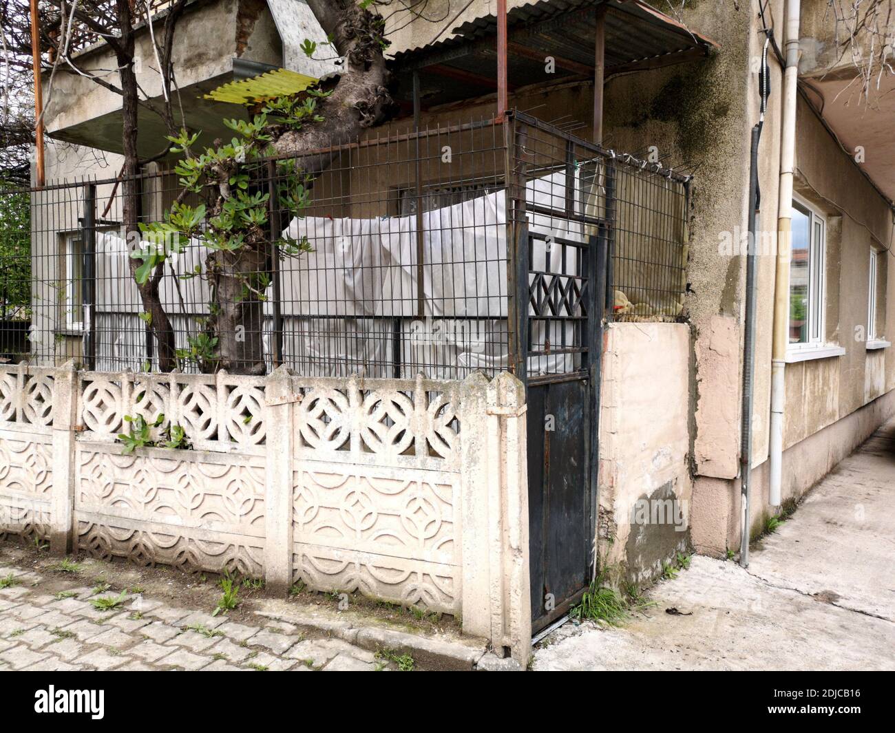 The front door of a house in a non-rich neighborhood Stock Photo - Alamy