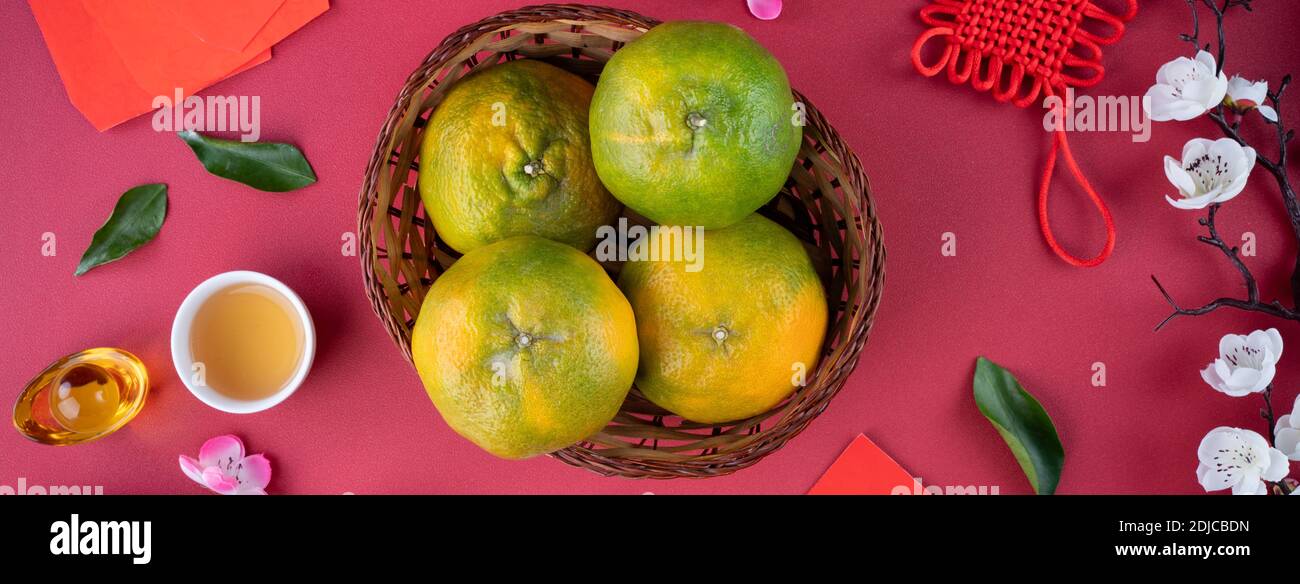 Top view of fresh ripe tangerine mandarin orange with fresh leaves on ...