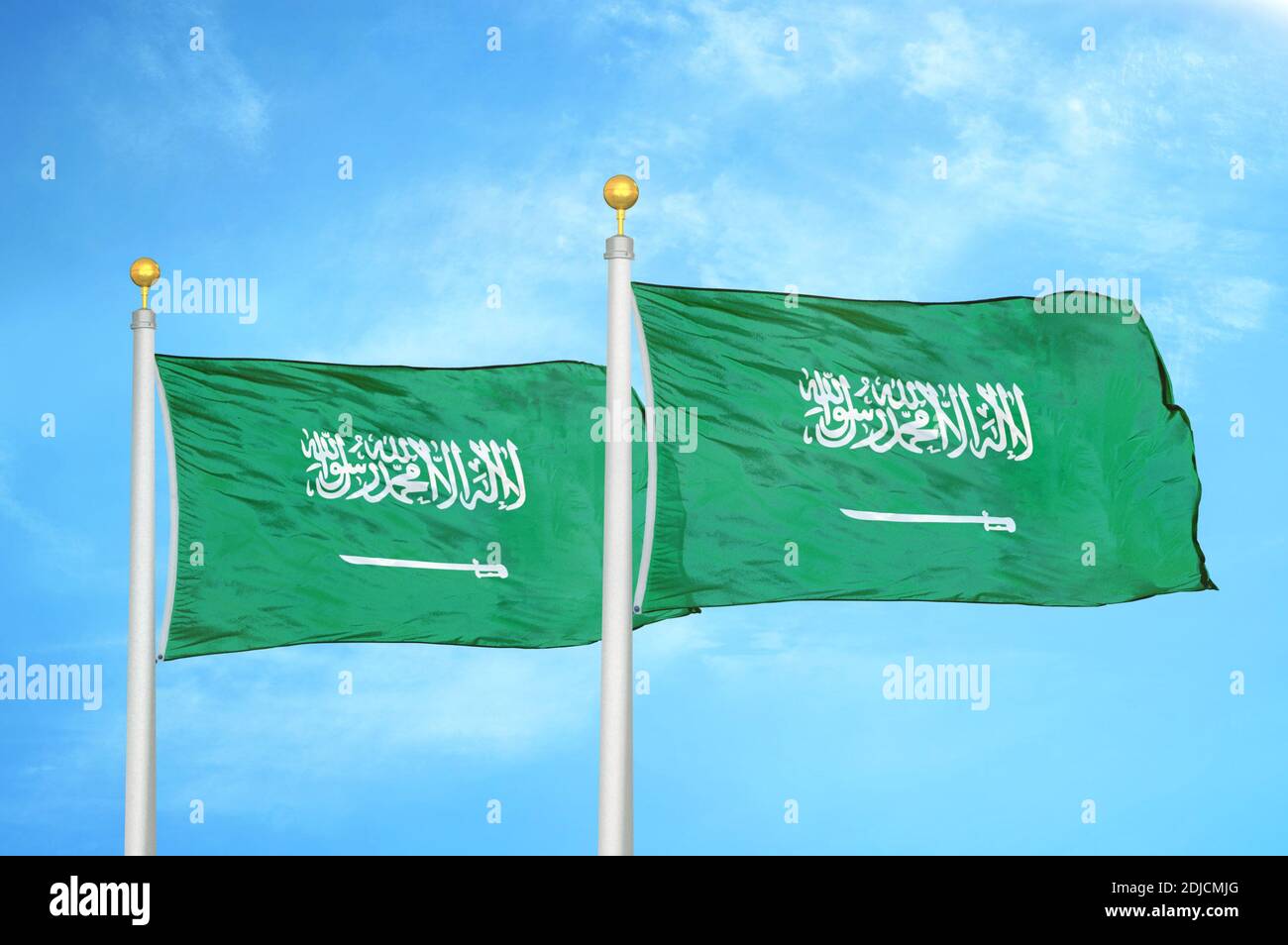 Saudi Arabia flags two flags on flagpoles and blue cloudy sky Stock ...