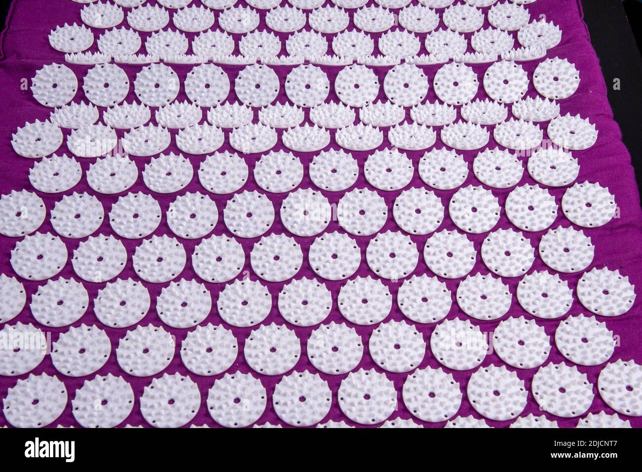 Tension mat with spikes for acupressure Stock Photo - Alamy