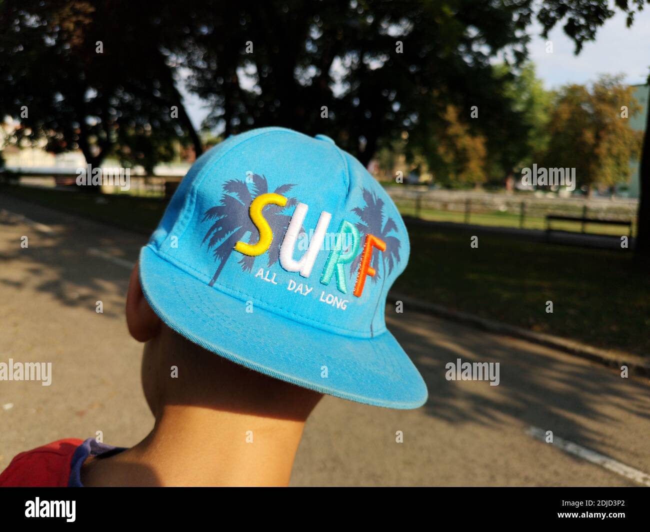 Boy wearing cap rear view hi-res stock photography and images - Alamy