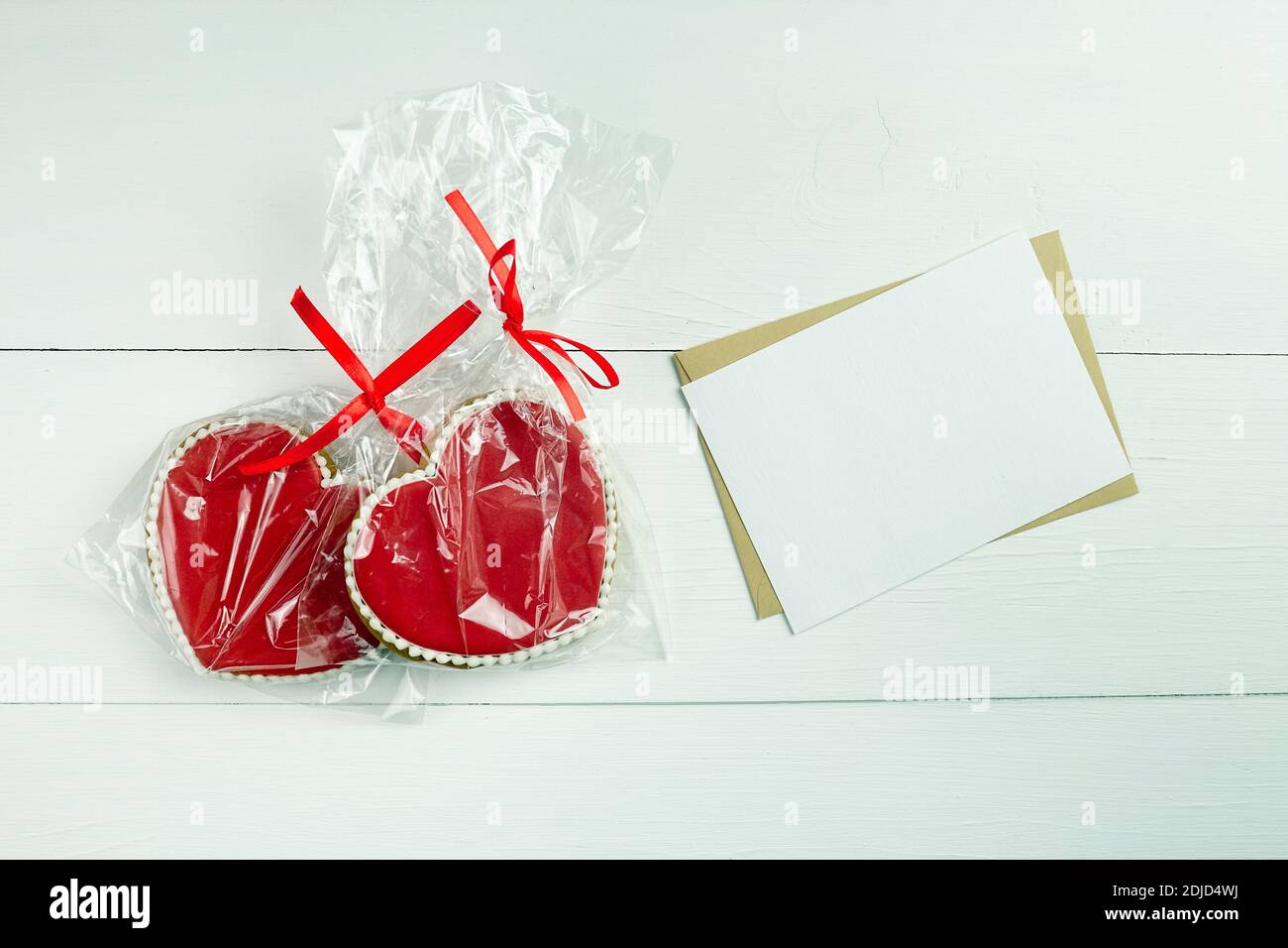 Greeting card mockup, white blank wish card with craft paper envelope ...