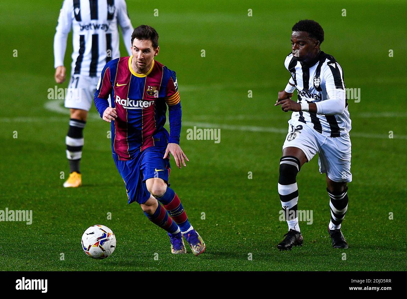 BARCELONA, SPAIN - DECEMBER 13: Lionel Messi of FC Barcelona, Mickael ...