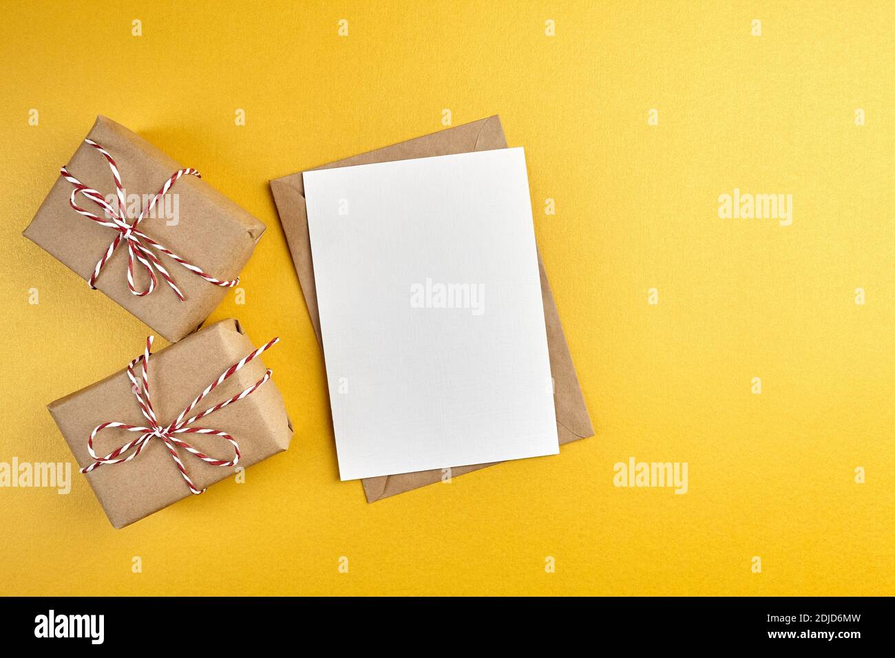 Greeting card mockup, white blank wish card with craft paper envelope ...