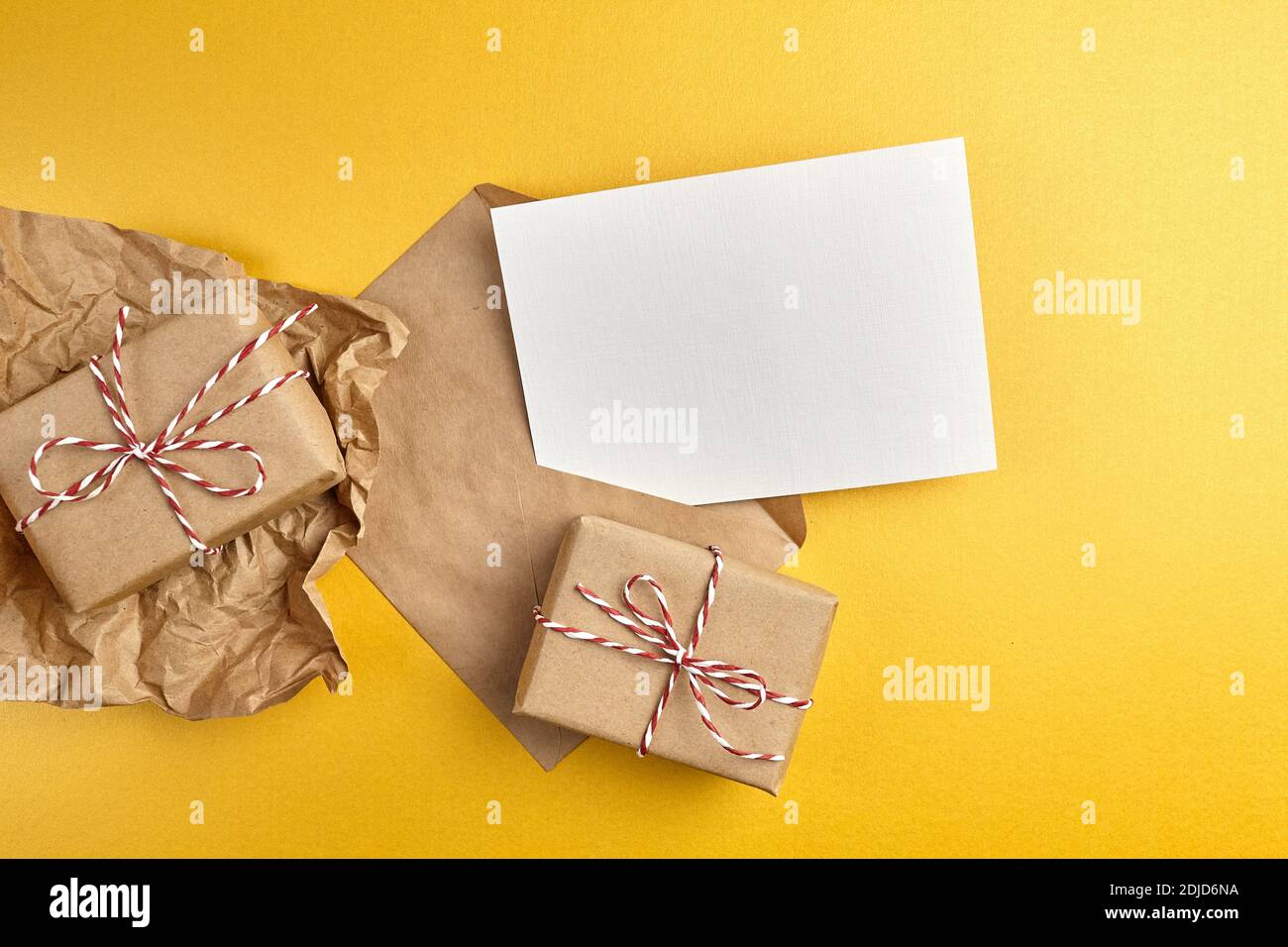 Greeting card mockup, white blank wish card with craft paper envelope ...