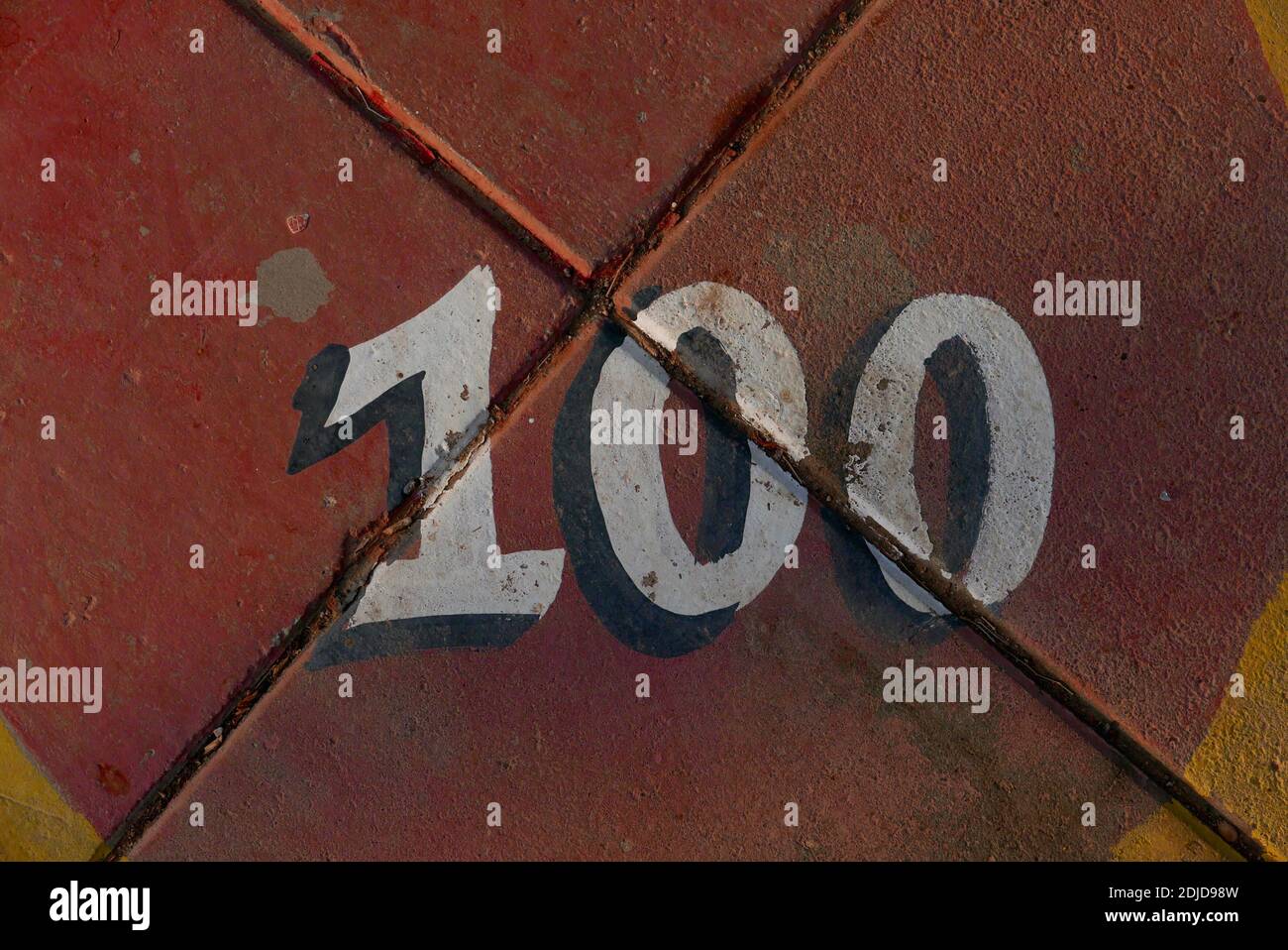 Close-up Of Number 100 On Wall Stock Photo - Alamy