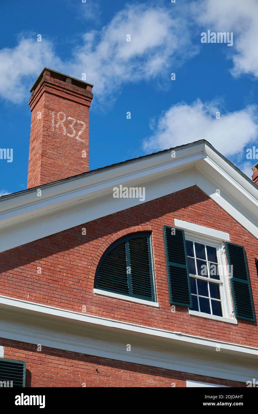 Roof and chimney details of a fine example of a fancy, old, historic ...