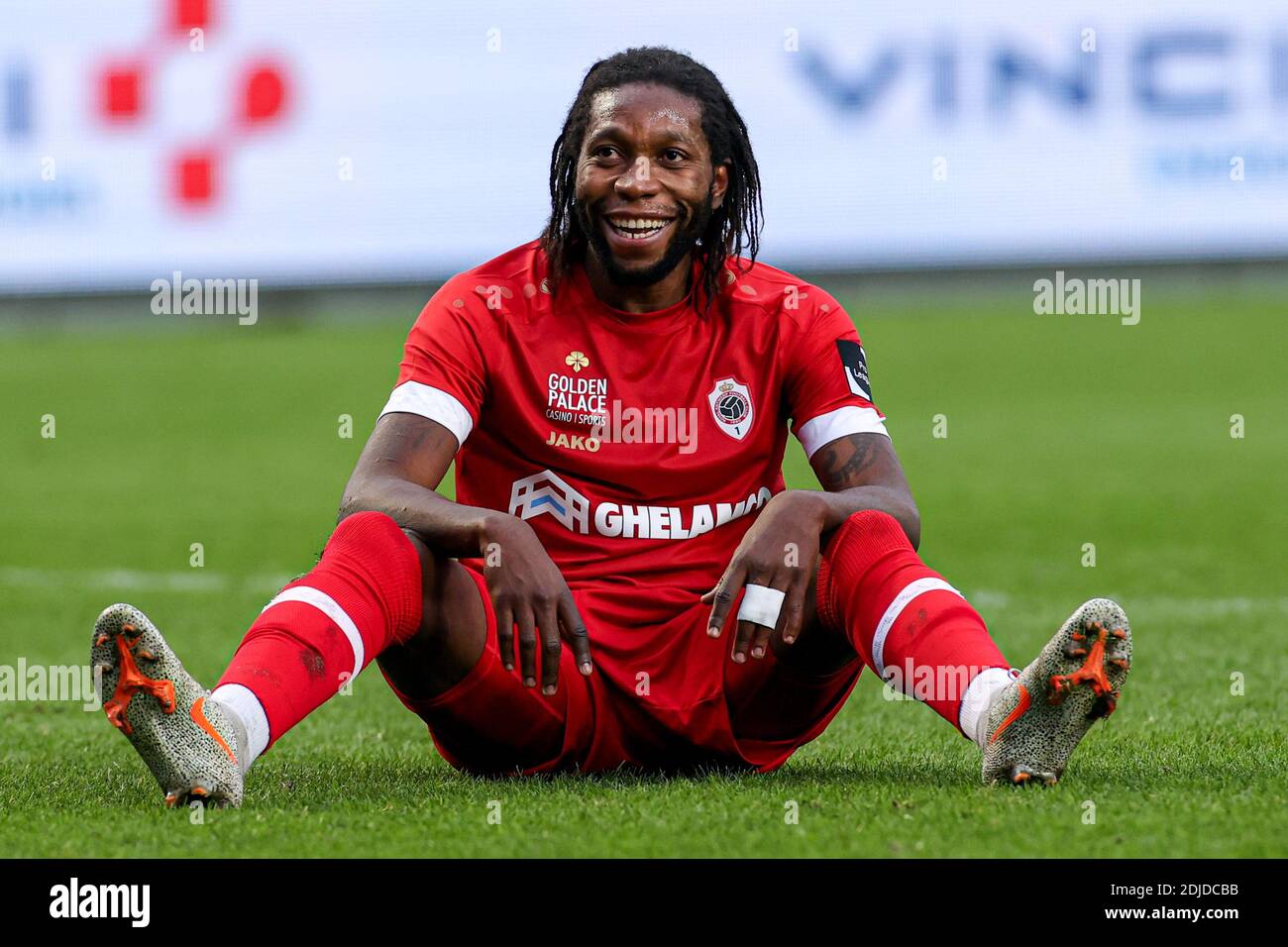 ANTWERP, BELGIUM - DECEMBER 13: Dieumerci Mbokani of Royal Antwerp FC sitting on pitch during ...