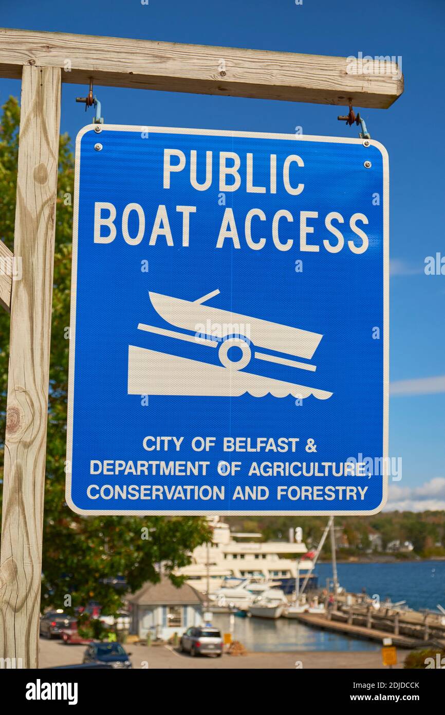 A metal blue Public Boat Access sign hangs on a wood frame at the ...