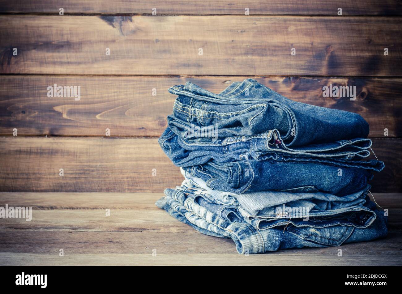 Folded denim on floor hi-res stock photography and images - Alamy