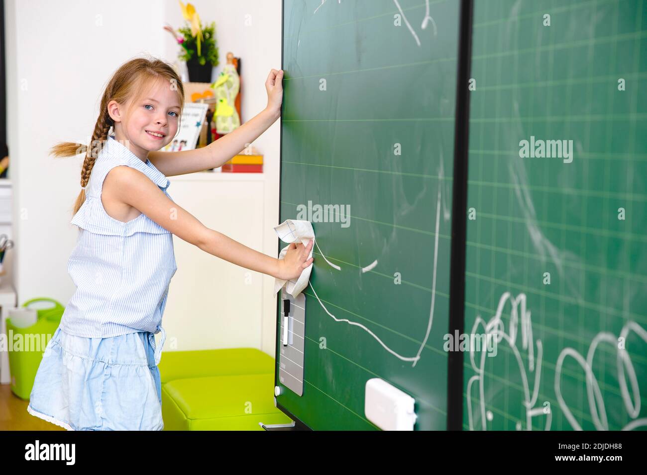 Child cleaning classroom hi-res stock photography and images - Alamy