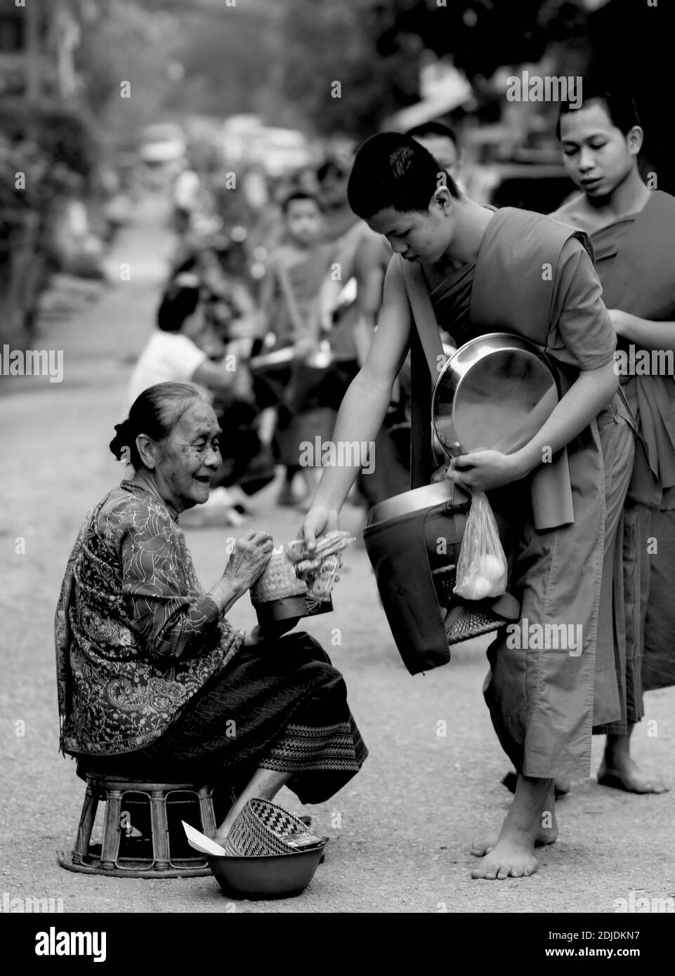 Giving alms Black and White Stock Photos & Images - Alamy