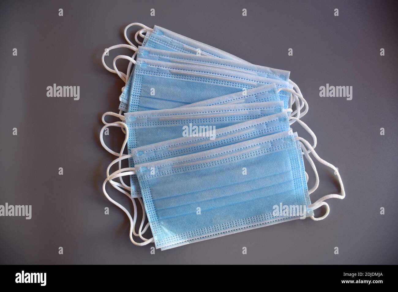 Blue surgical masks isolated hi-res stock photography and images - Alamy
