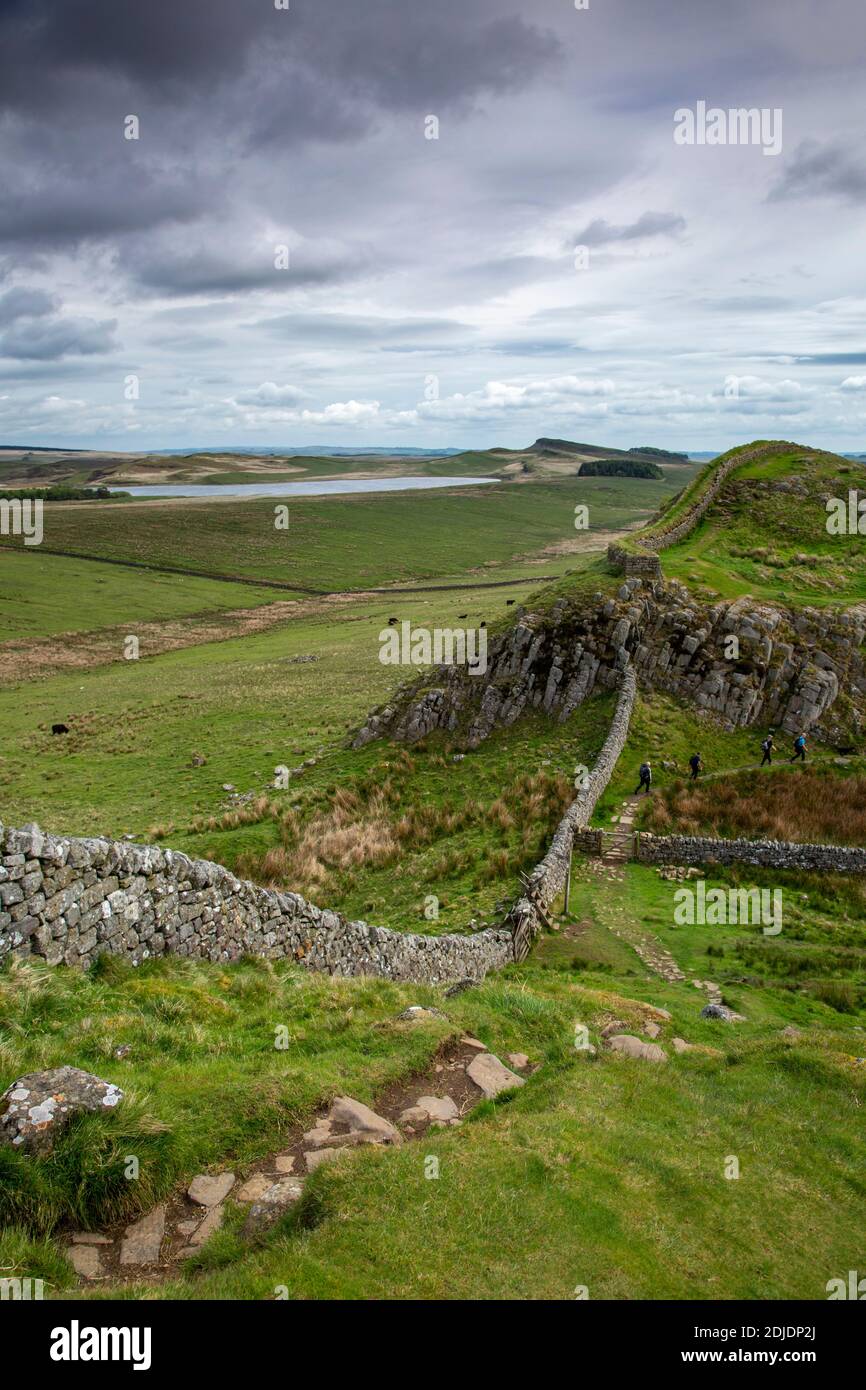 Hikers and ruins of Roman walls, Hadrian's Wall, near Homesteads ...