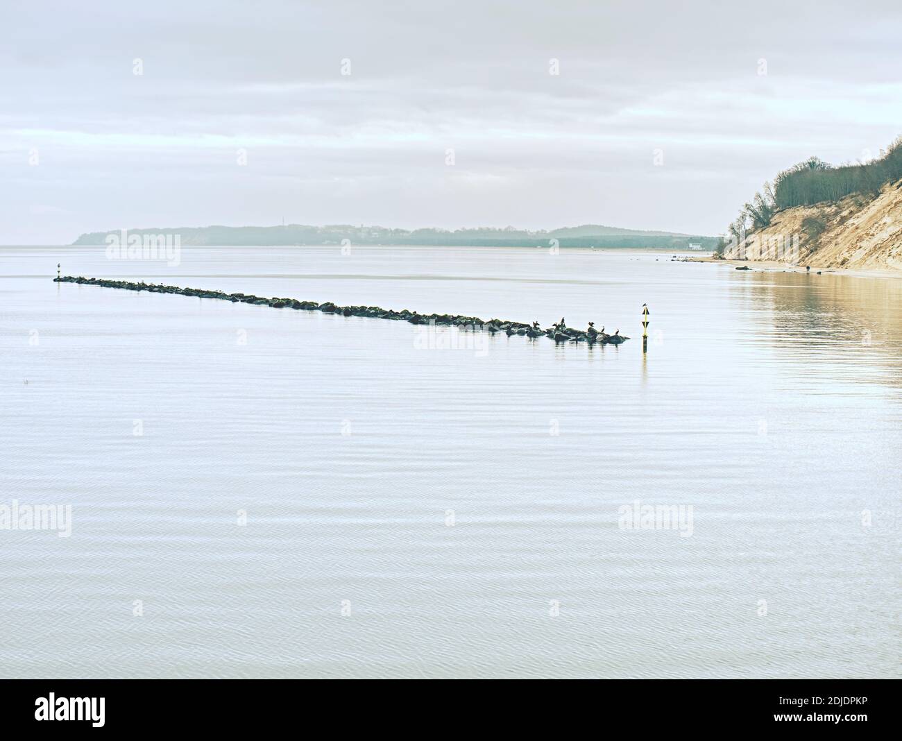 Old timber sea groynes hi-res stock photography and images - Alamy